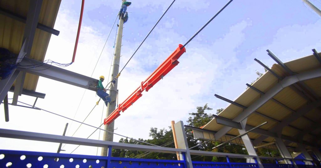 MORE Power clears ISAT-U overpass of high-voltage wires