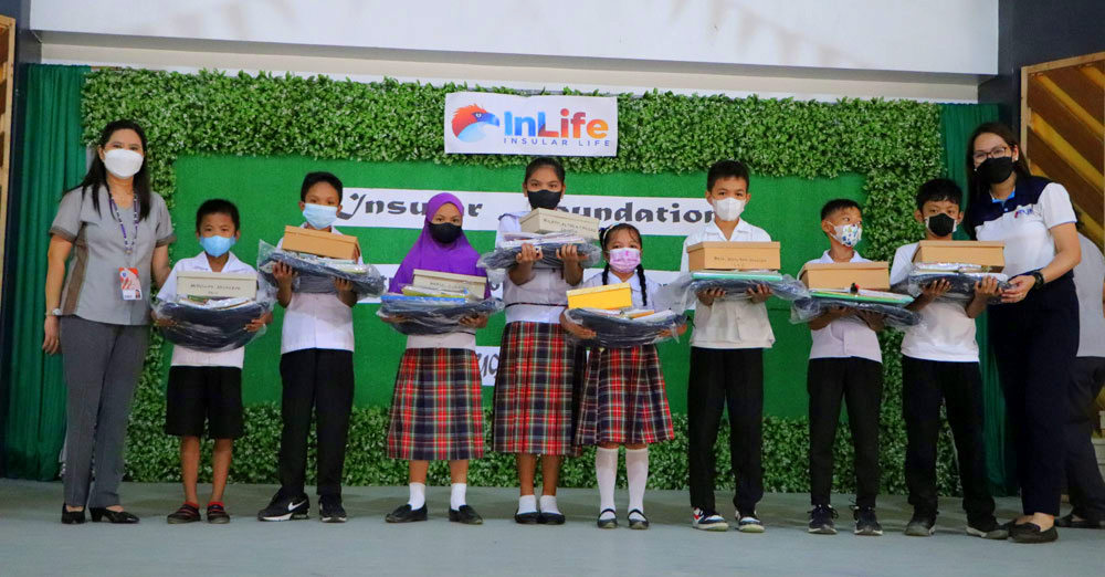 Insular Foundation turns over school supplies to scholars